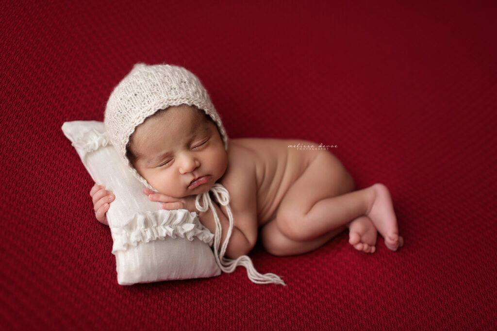 Baby girl side laying pose | Melissa Devoe Photography
